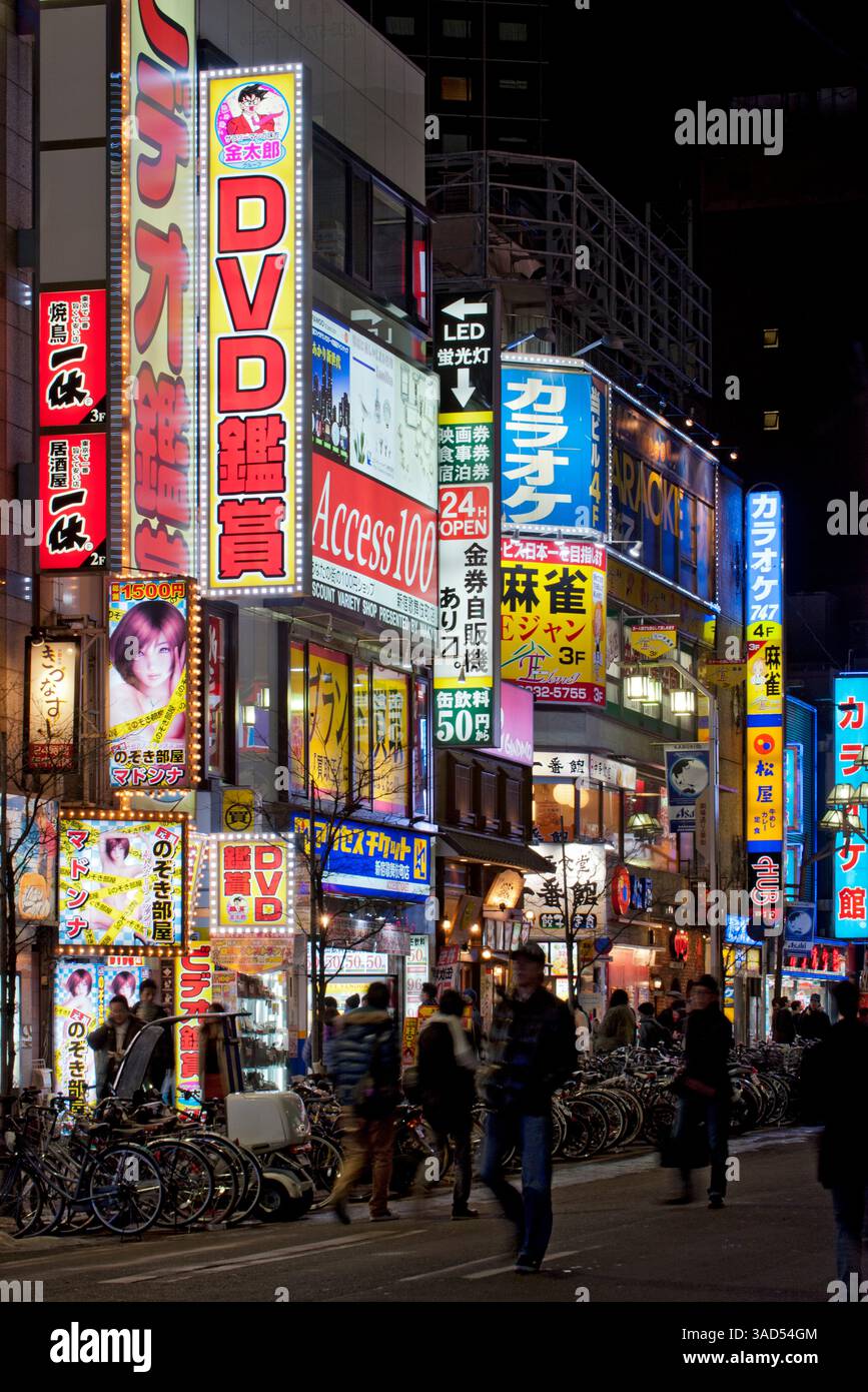 Kabukicho building facades glow in the night with neon signs, the ...