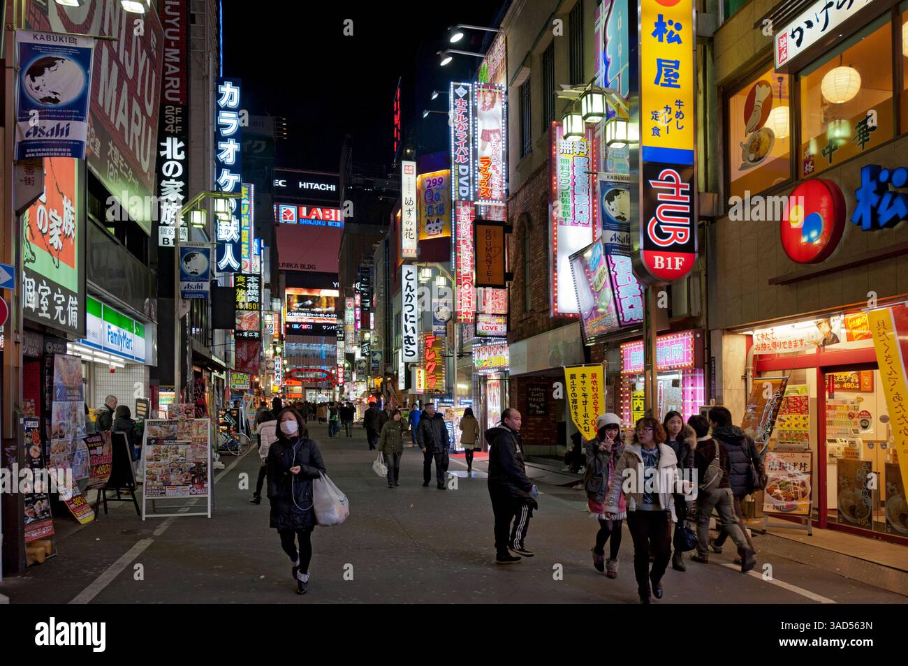 Kabukicho building facades glow in the night with neon signs, the ...