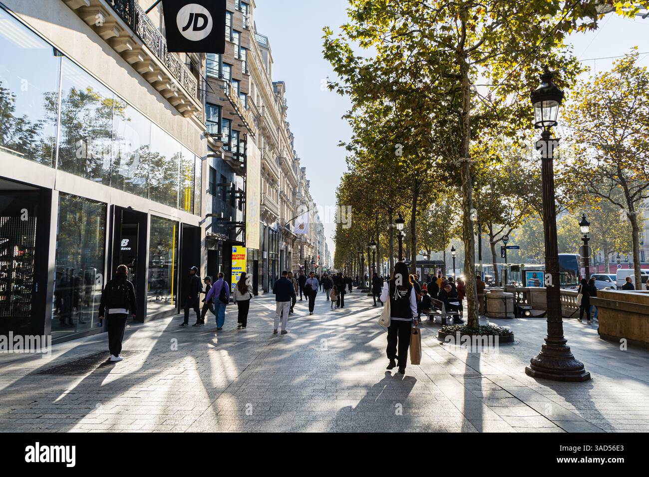 Central street of Paris The Avenue des Champs-Elysees with luxury shops and street life. Paris ...