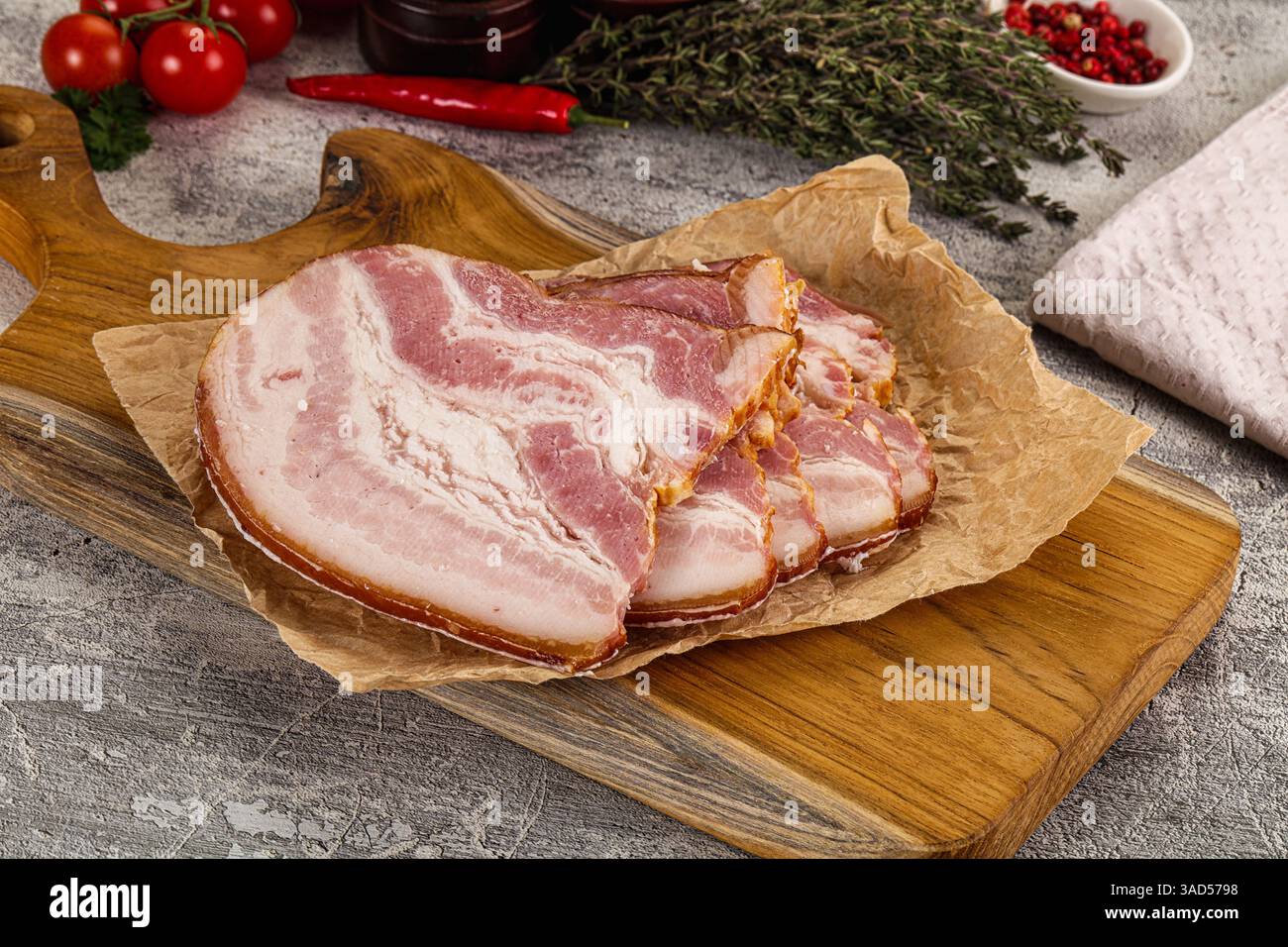 Smoked pork belly slices fat snack Stock Photo - Alamy