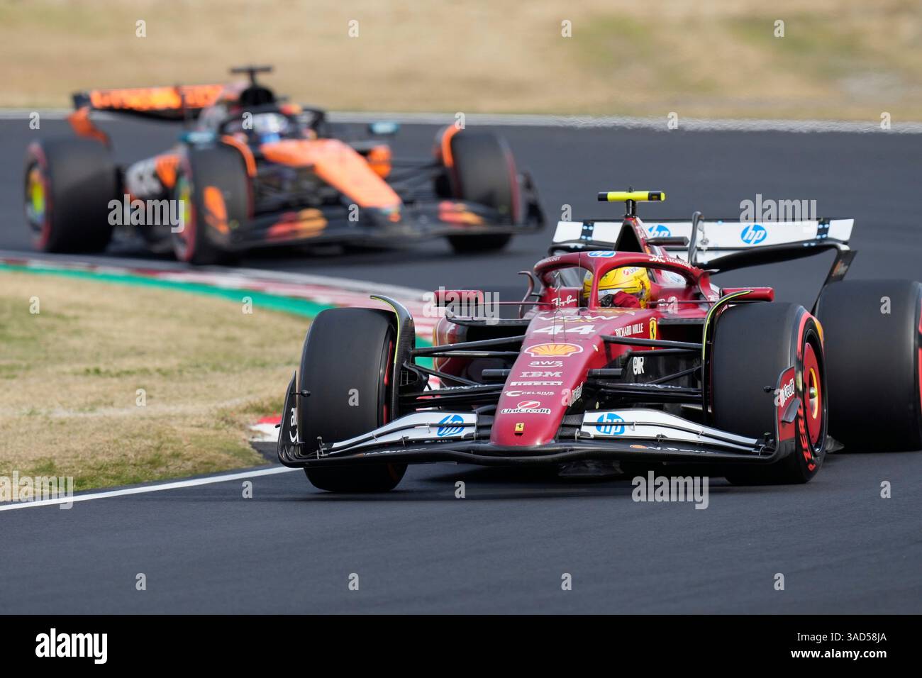 Ferrari driver Lewis Hamilton of Britain leads McLaren driver Oscar ...