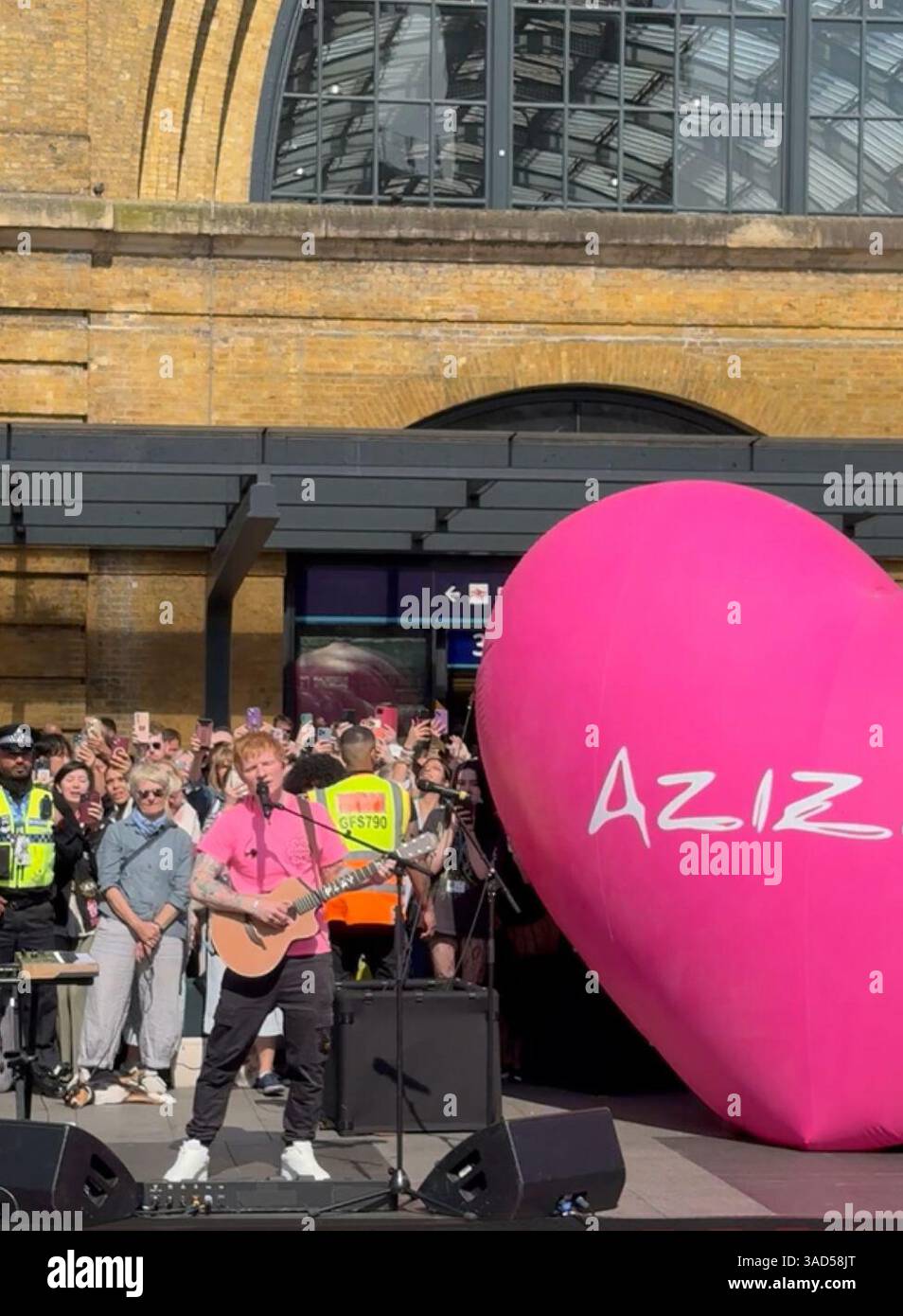 Handout photo of Ed Sheeran performing outside outside King's Cross ...