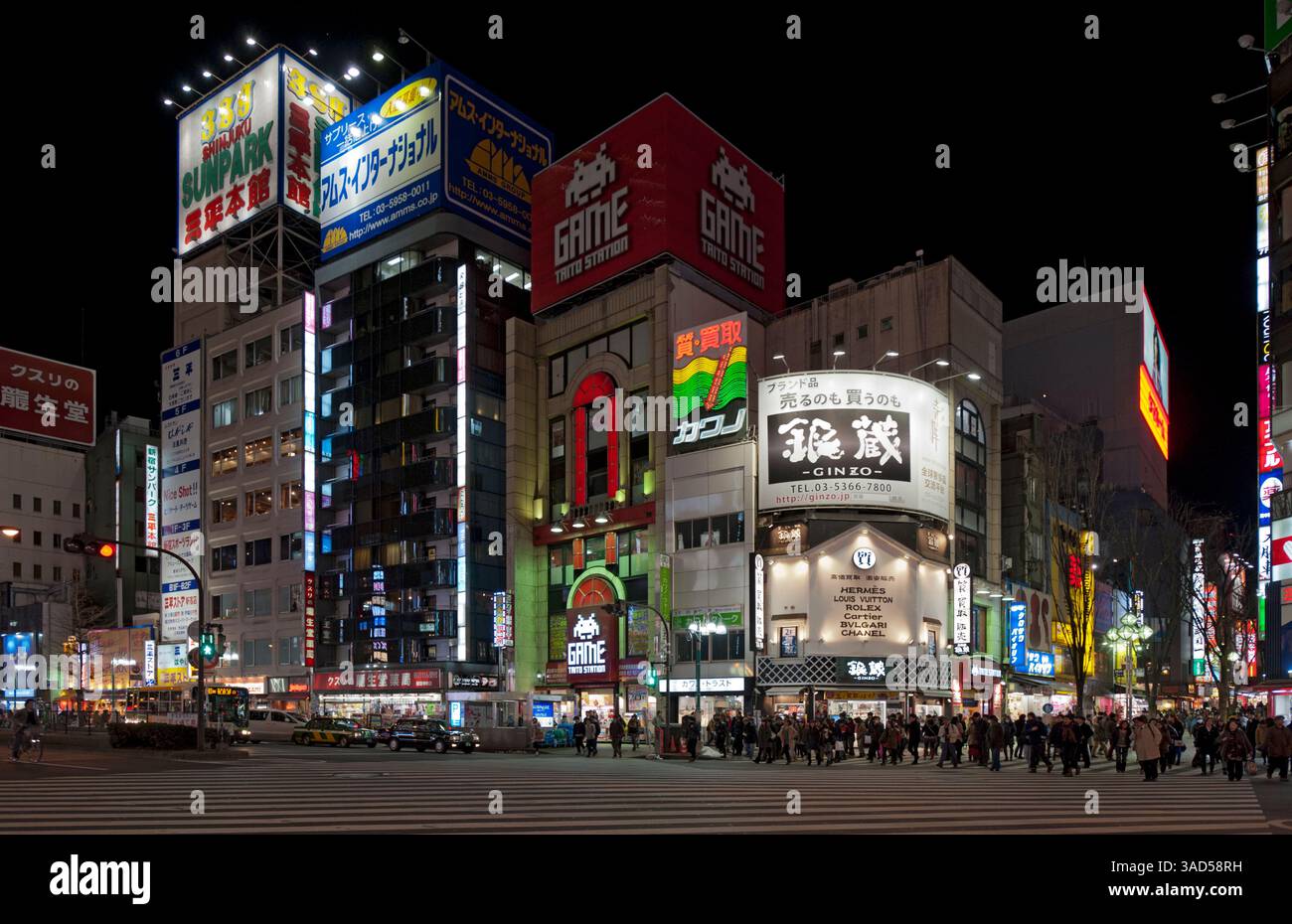 Kabukicho building facades glow in the night with neon signs, the ...