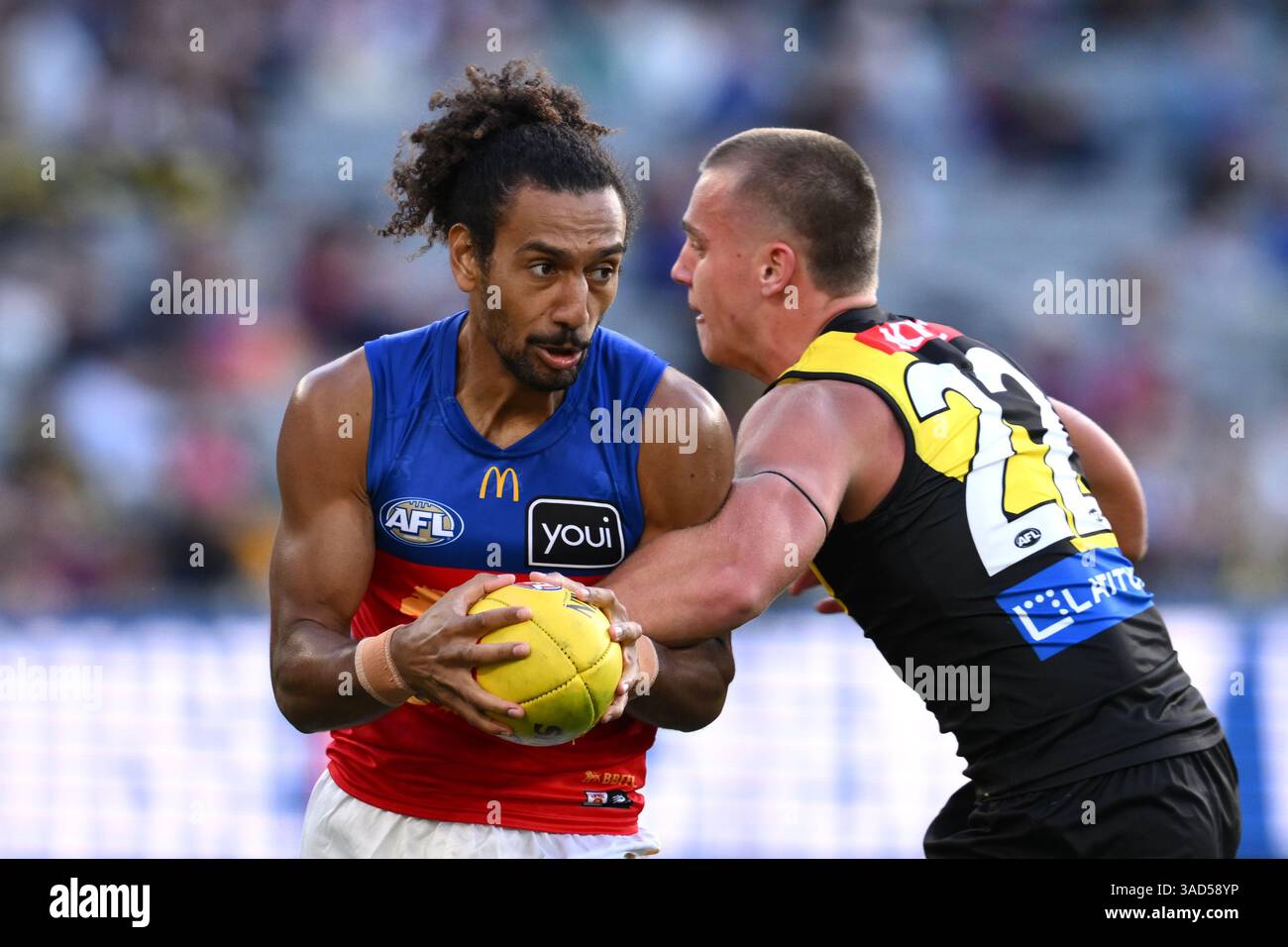 Melbourne, Australia. 05th Apr, 2025. Sam Lalor of Richmond (right ...