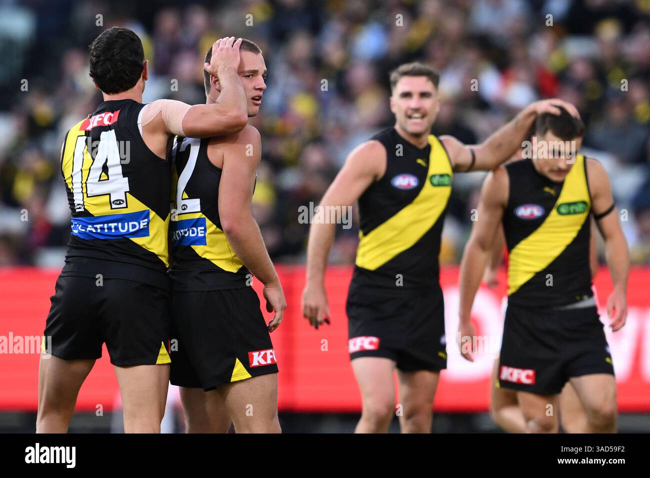Sam Lalor of Richmond (2nd left) celebrates scoring a goal during the ...