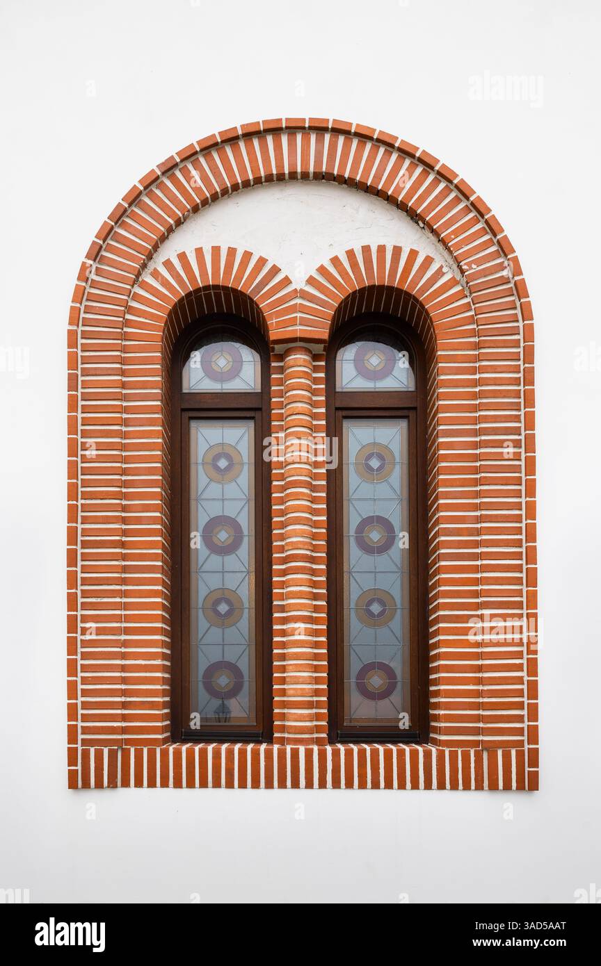 beautiful window with red brick arch on white background Stock Photo ...