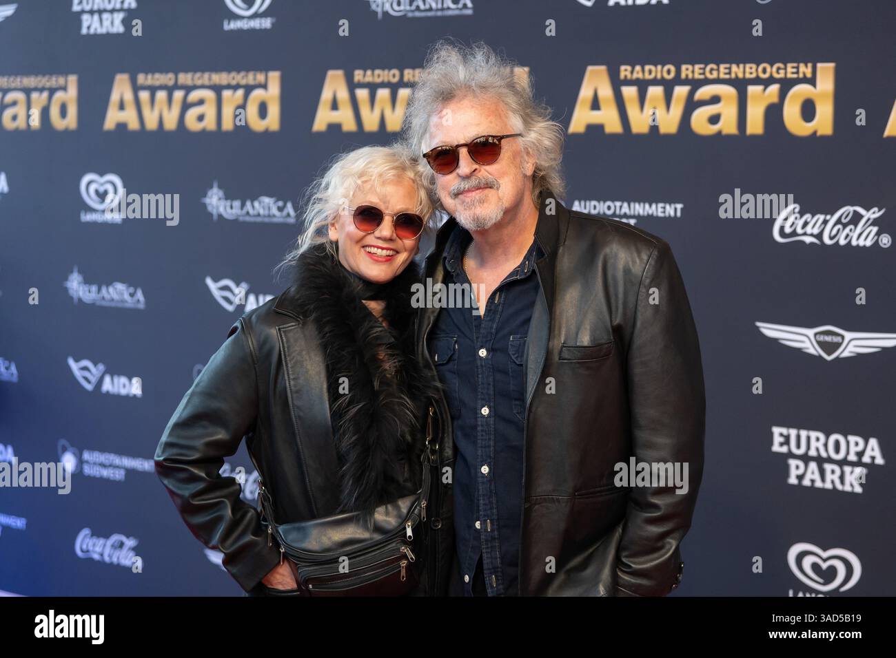 04 April 2025, Baden-Württemberg, Rust: Wolfgang Niedecken and his wife ...
