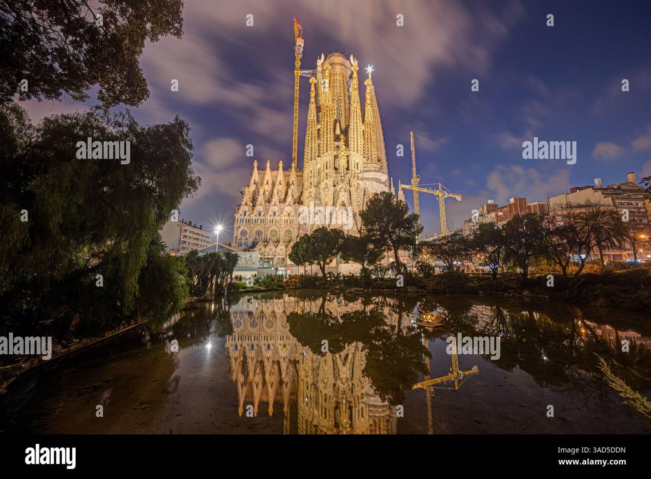The illuminated Nativity Facade of the famous Sagrada Familia in ...