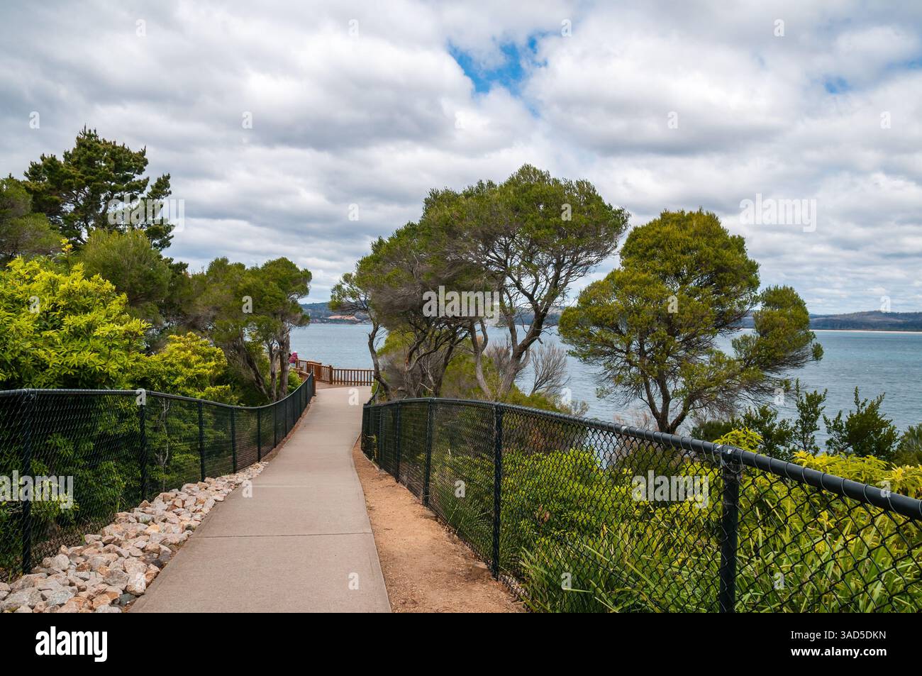 Coastal walking trail with scenic ocean views, pathway to a wooden ...
