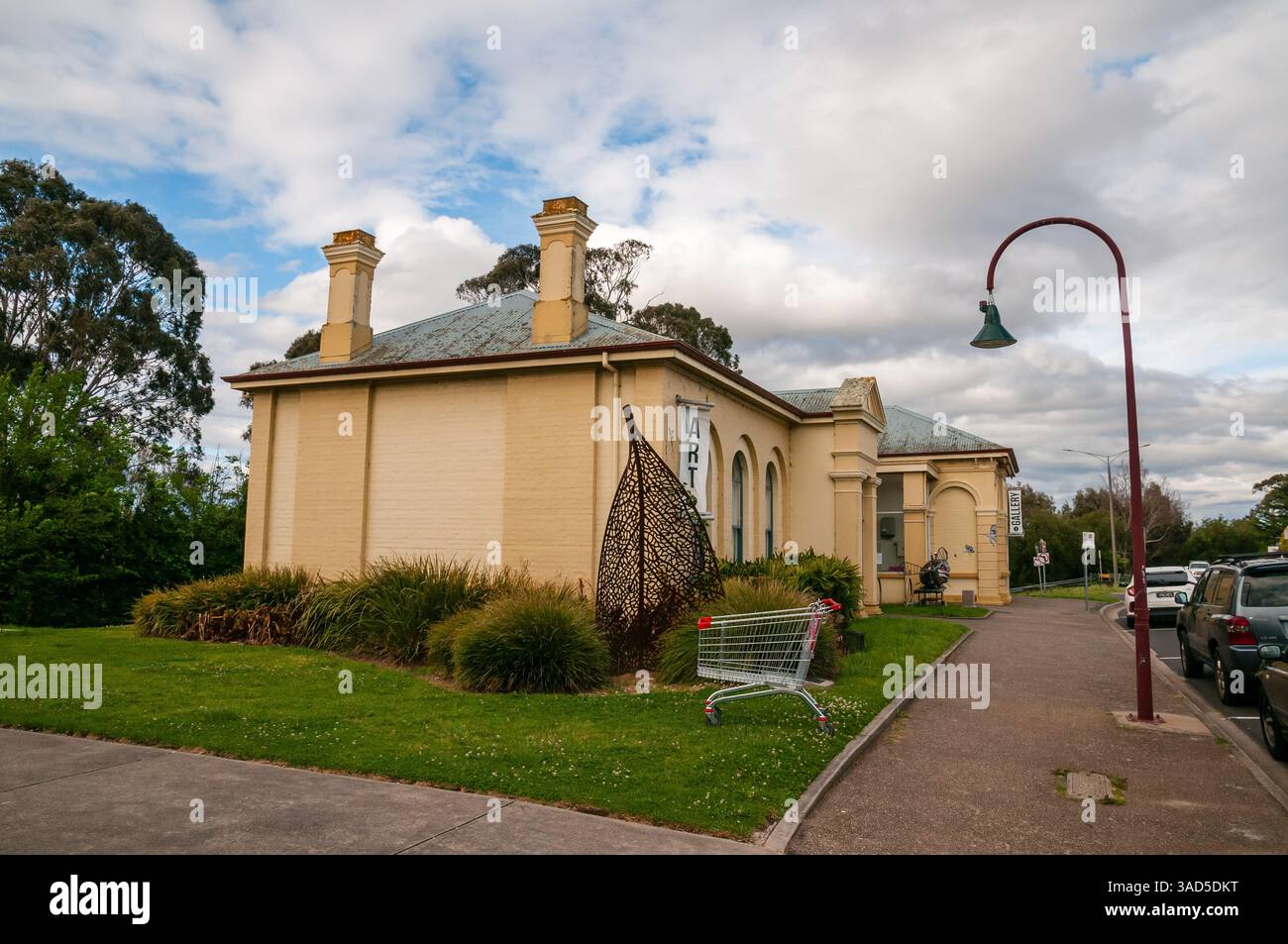 Historic art gallery building with modern sculpture, abandoned shopping ...