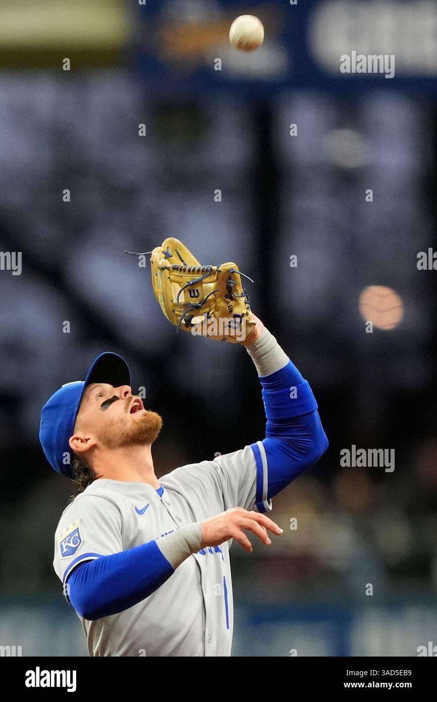 Kansas City Royals' Bobby Witt Jr. catches a fly ball during the first ...