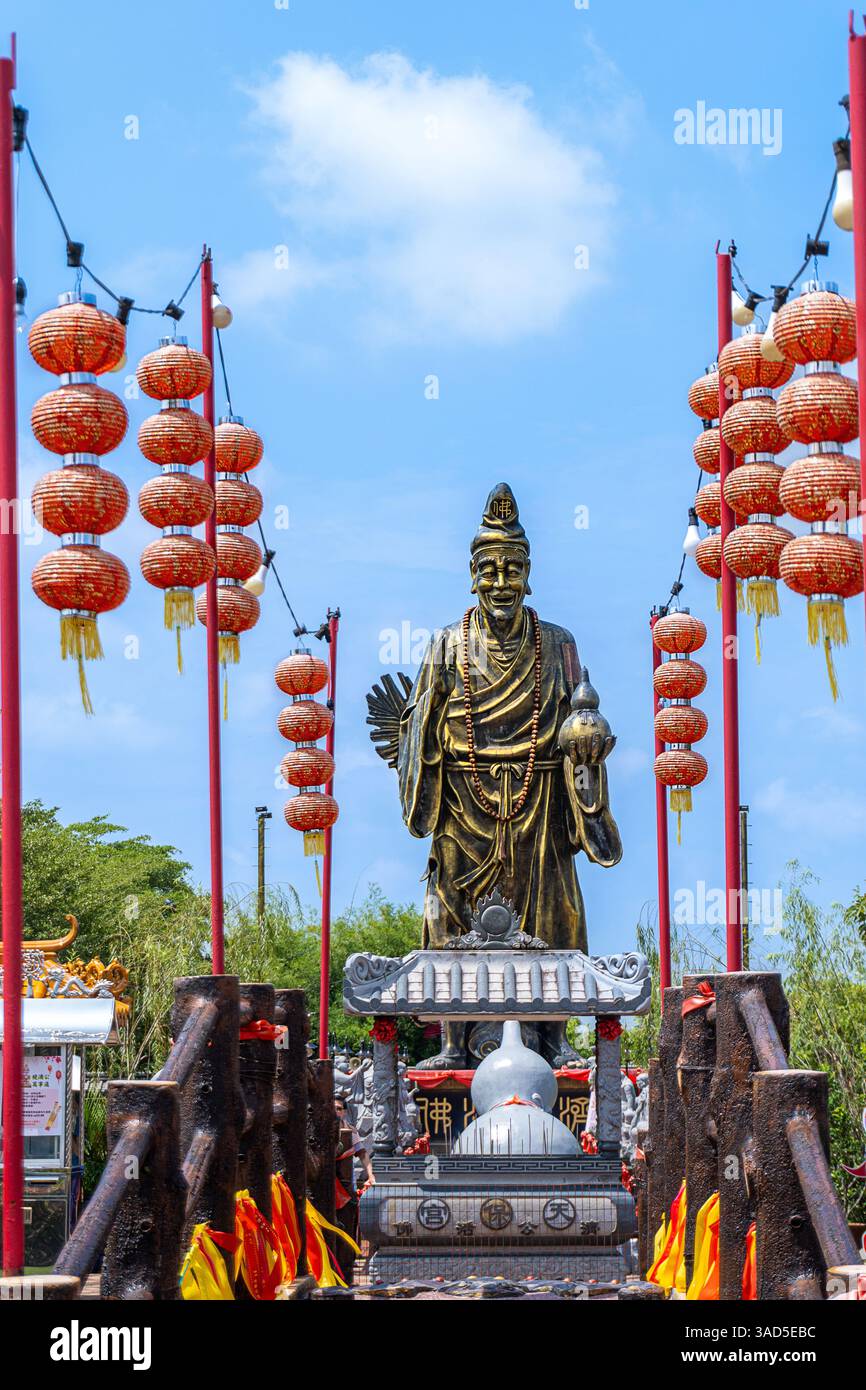 Yong Peng, Johor, Malaysia: Ji Gong Statue Framed by Festive Red ...