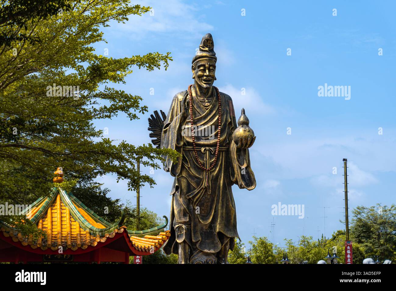 Ji Gong Statue Rising Above Temple Roof in Yong Peng, Johor, Malaysia Stock Photo - Alamy