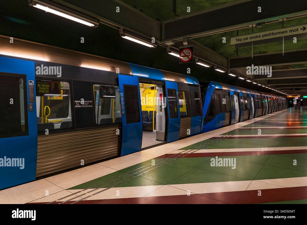SWEDEN, STOCKHOLM - MARCH 09, 2025: A metro train pulls into a station ...