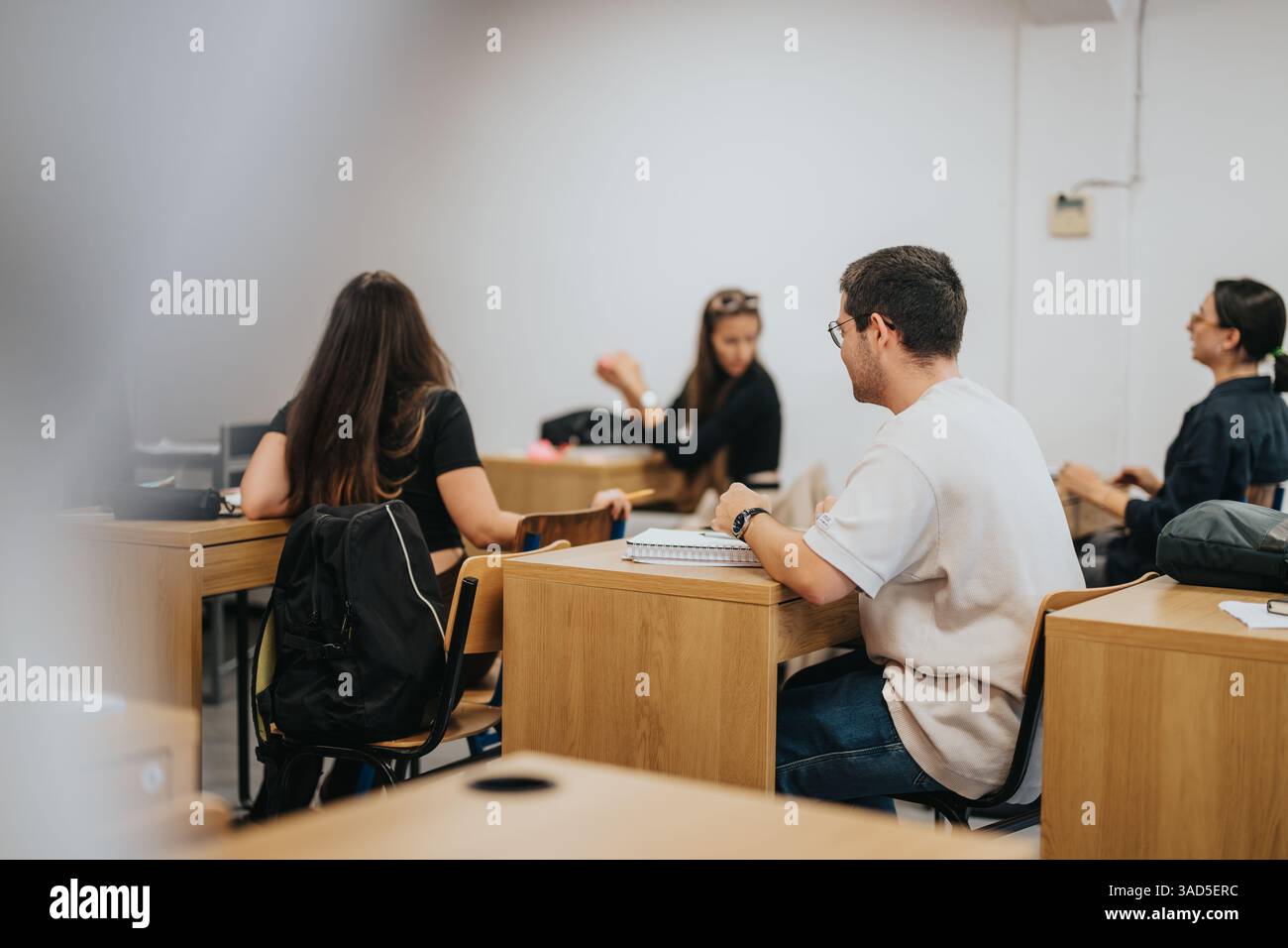 High school students engaged in classroom activities Stock Photo - Alamy