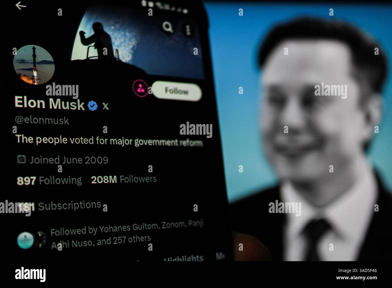 In this photo illustration, Elon Musk X profile account is displayed on ...