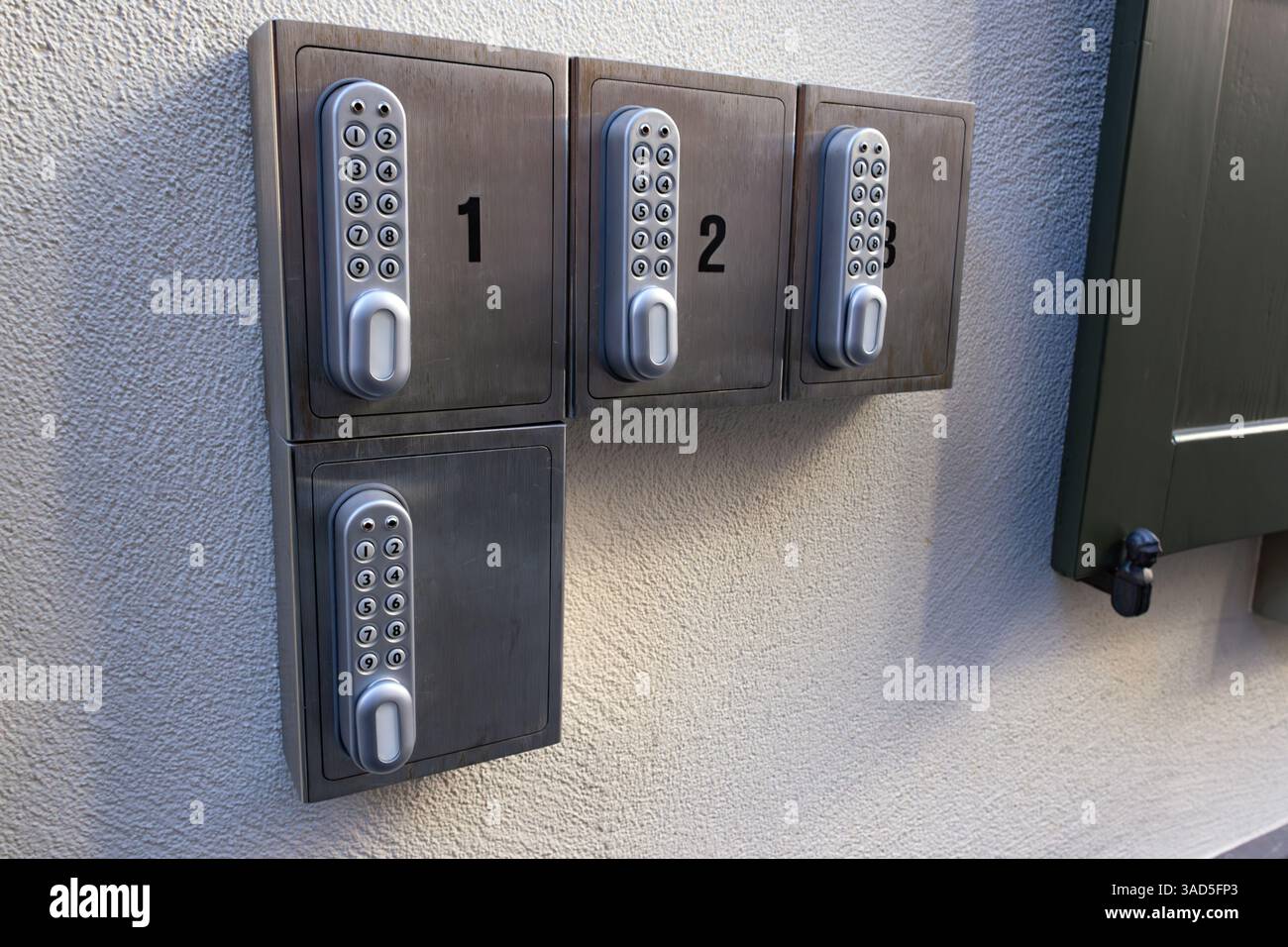 Key boxes for rental apartments on the exterior wall Stock Photo - Alamy