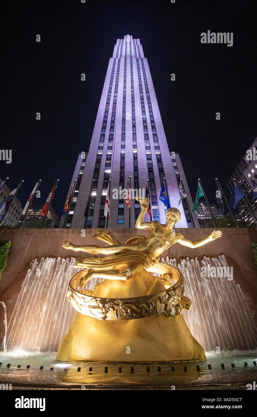 Fountain with Prometheus golden statue (by Paul Manship) and behind ...