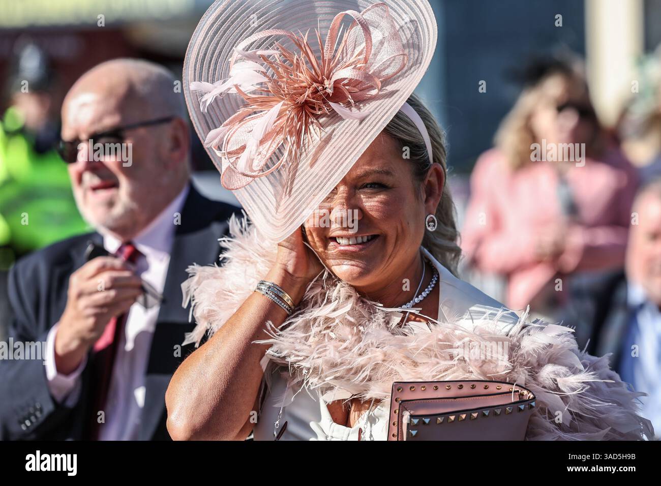 Racegoers arrive at the Aintree during the Randox Grand National 2025 ...