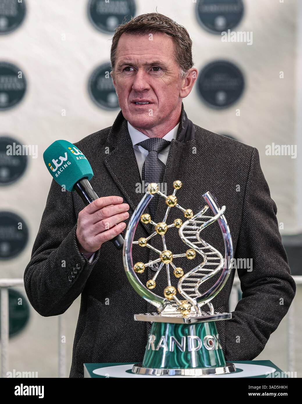A P McCoy aka Tony McCoy speaks to ITV with the Grand National Trophy during the Randox Grand ...