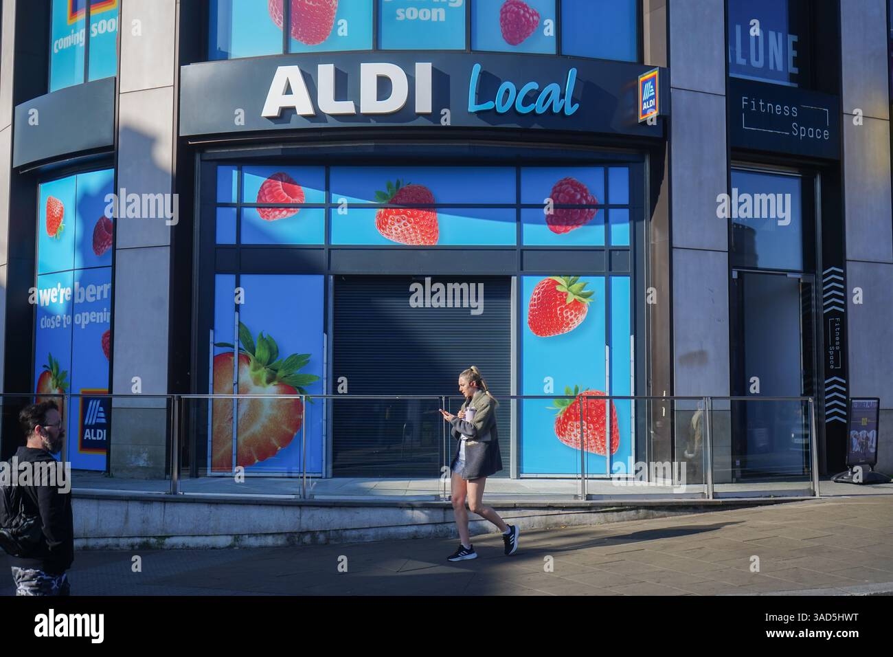 London UK 5 April 2025. Strawberries cover the front of the new Aldi ...