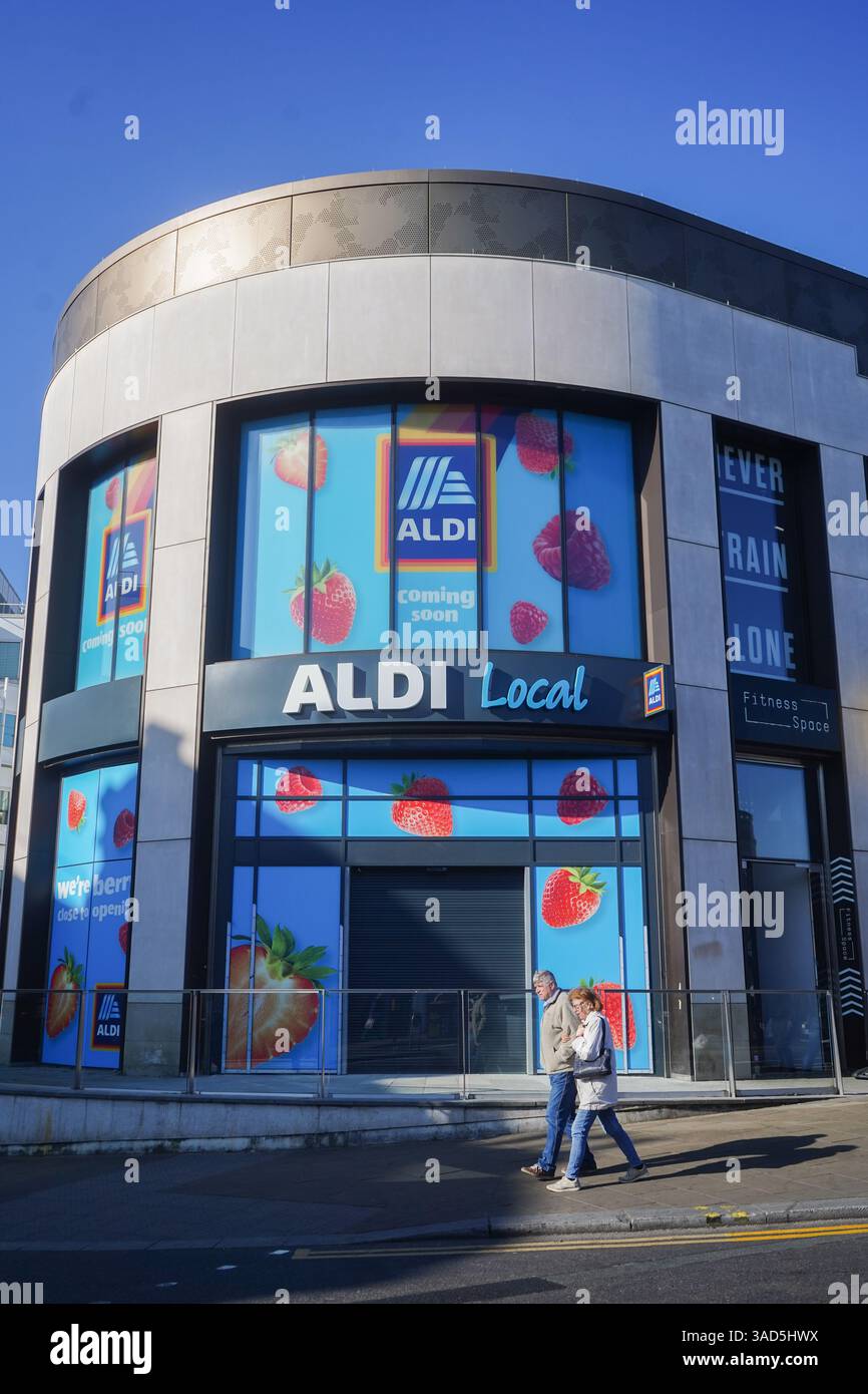 London UK 5 April 2025. Strawberries cover the front of the new Aldi ...
