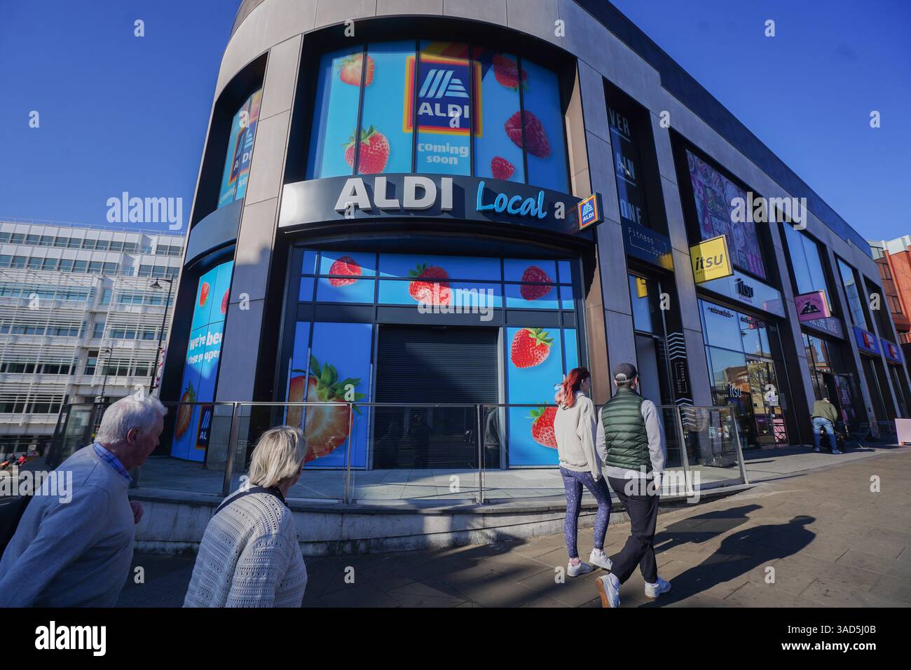 London UK 5 April 2025. Strawberries cover the front of the new Aldi ...