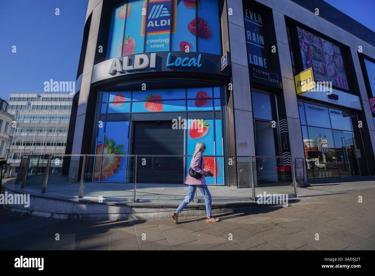 London UK 5 April 2025. Strawberries cover the front of the new Aldi ...