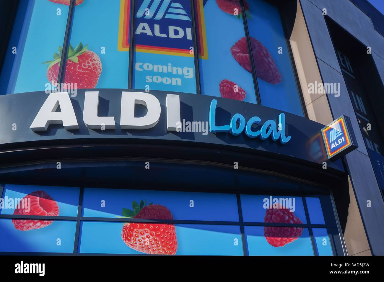 London UK 5 April 2025. Strawberries cover the front of the new Aldi ...