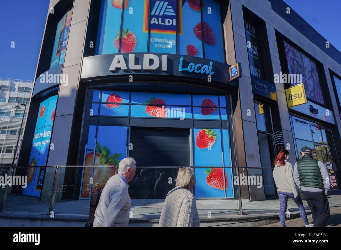 London UK 5 April 2025. Strawberries cover the front of the new Aldi ...