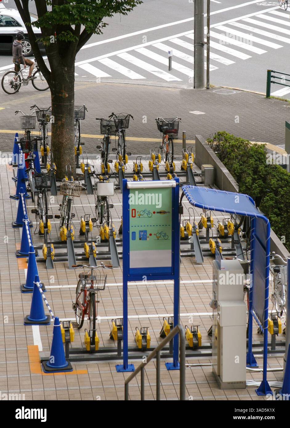 Bicycle parking in Tokyo city. Japan. City bikes parking for rent Stock ...