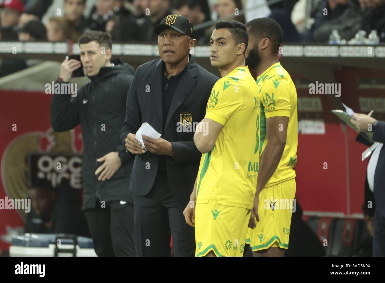 Coach of Nantes Antoine Kombouare, Mostafa Mohamed of Nantes during the ...
