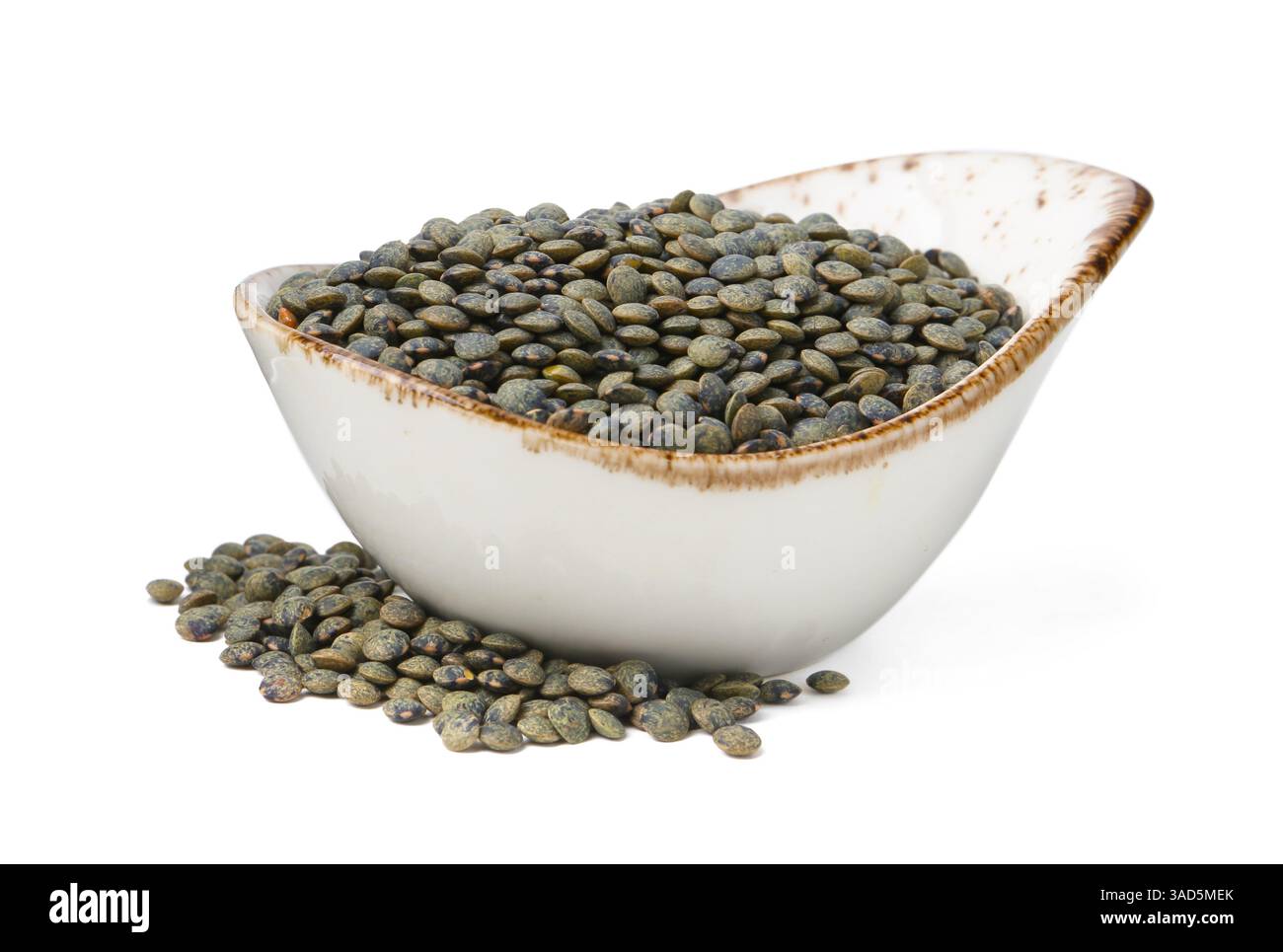 Raw lentils in bowl isolated on white Stock Photo - Alamy