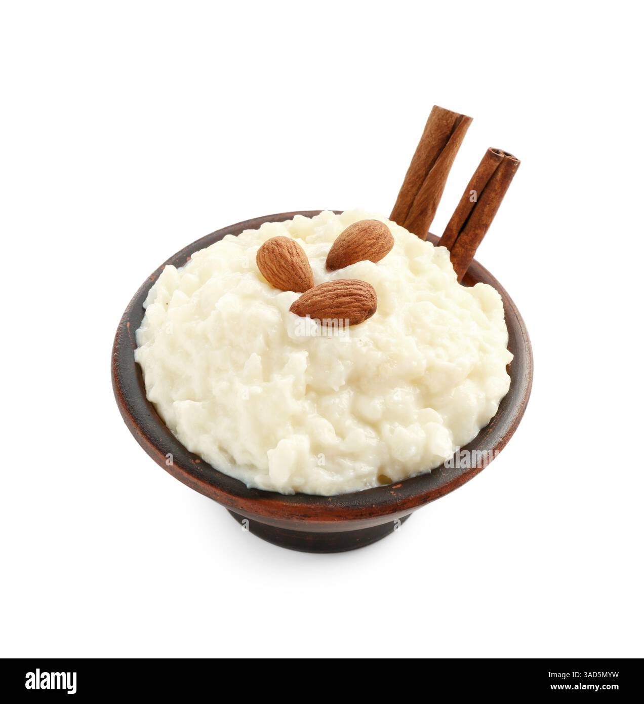 Delicious rice pudding with almonds and cinnamon sticks isolated on ...