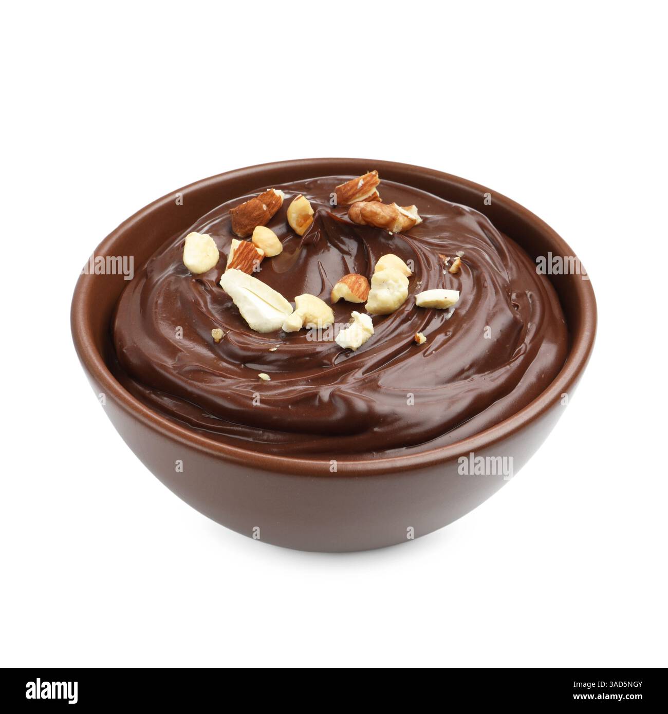 Delicious chocolate pudding with nuts in bowl isolated on white Stock ...