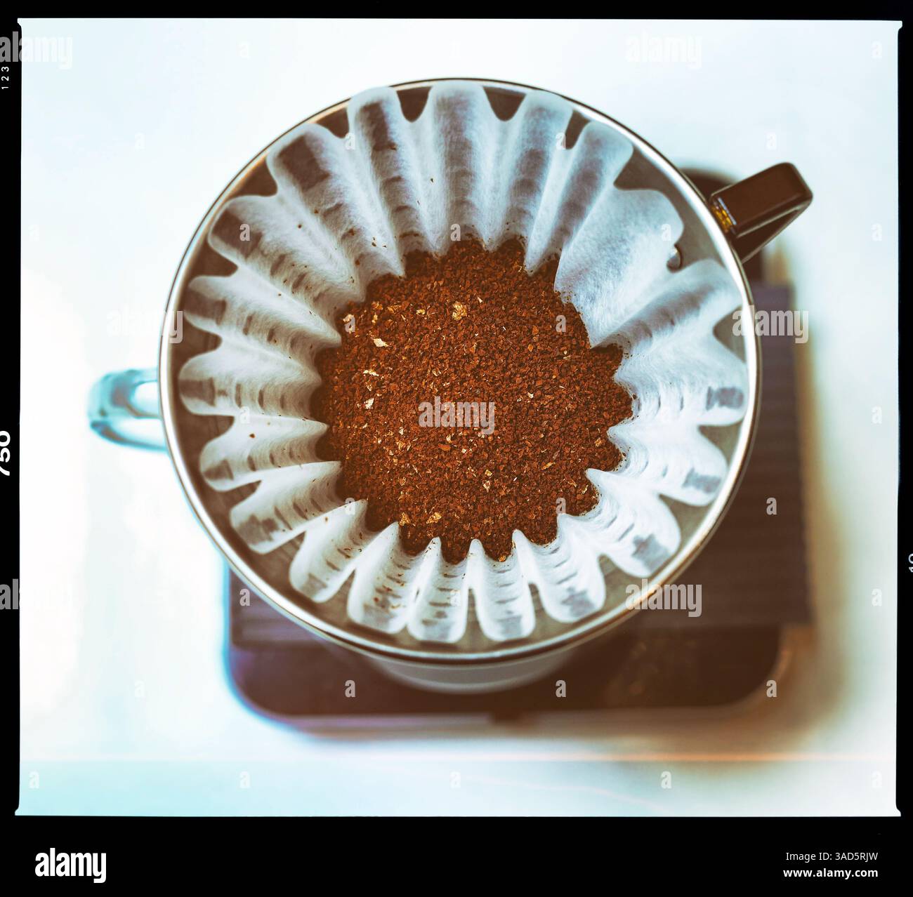 Ground coffee in filter white background overhead view Stock Photo - Alamy