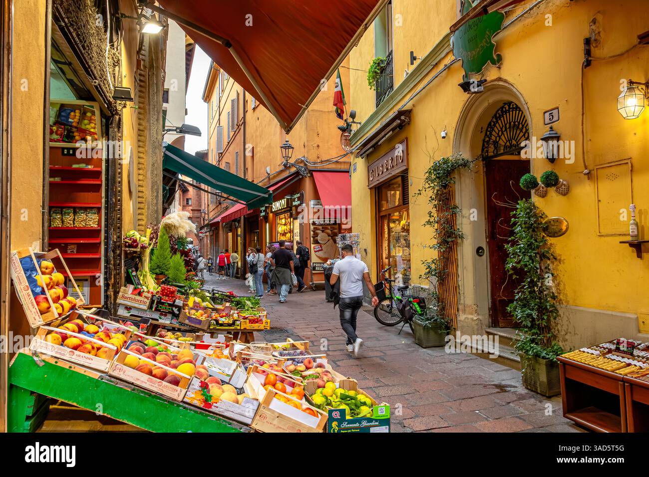 A fruit and vegetable stall on Via Drapperie, a narrow street in the ...