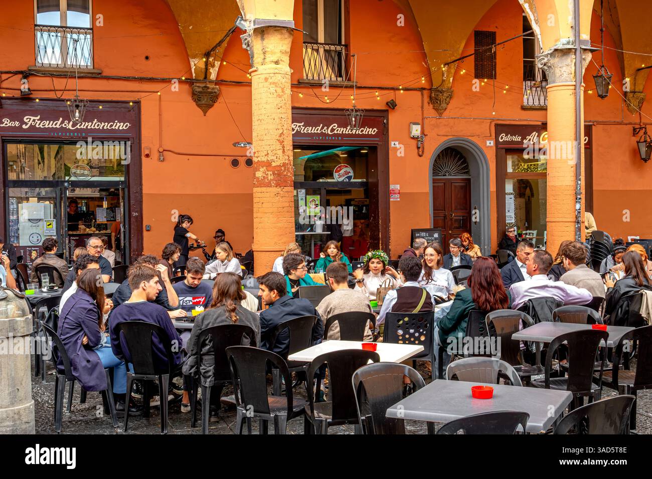 A girl wearing a laurel wreath at a graduation celebration at Bar Freud & Cantontino on Piazza ...