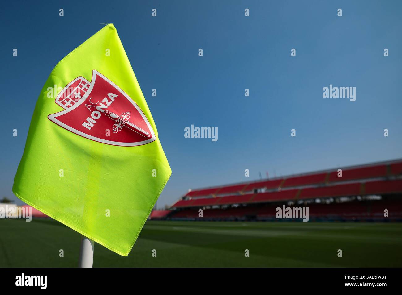 Monza, Italy, 5th April 2025. A corner flag bearing the AC Monza club ...