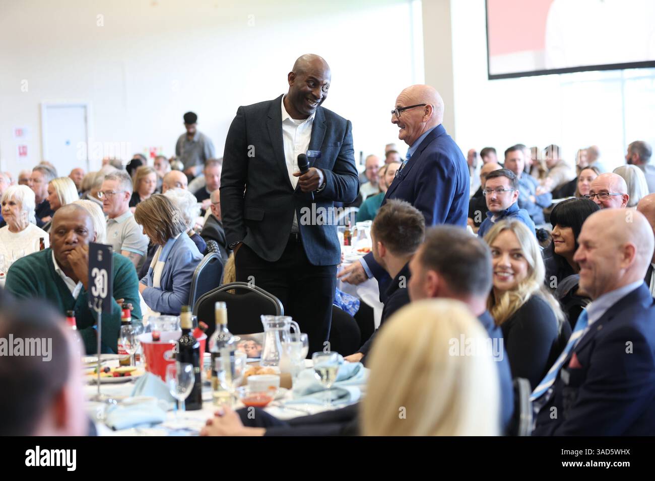 Former Coventry City player Dele Adebola (left) being interviewed ...