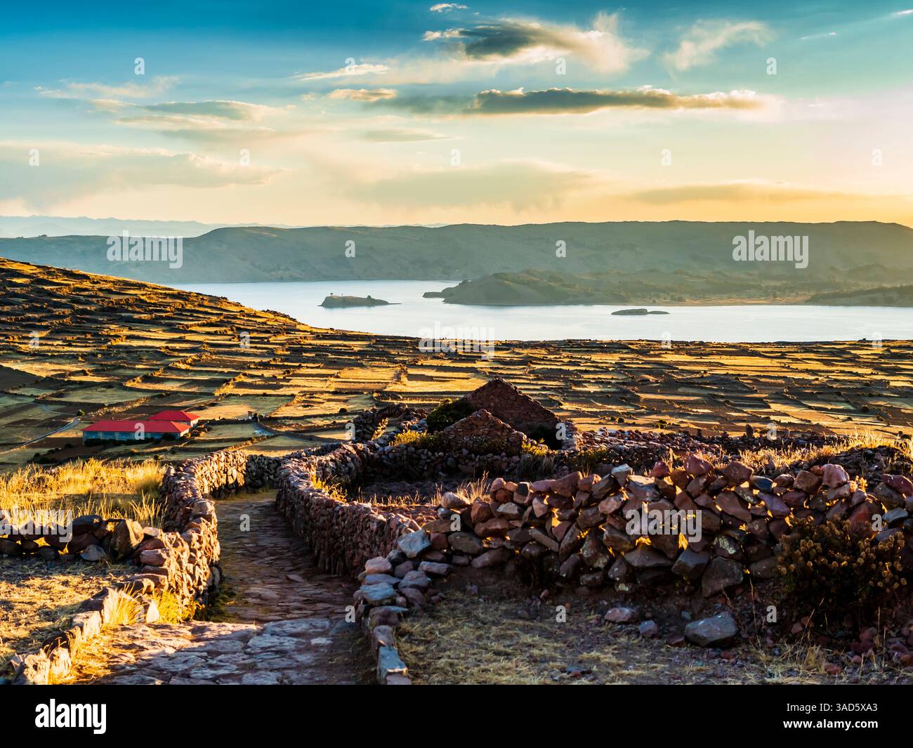 Amazing landscape on island Amantani at sunset with stepped terraced ...