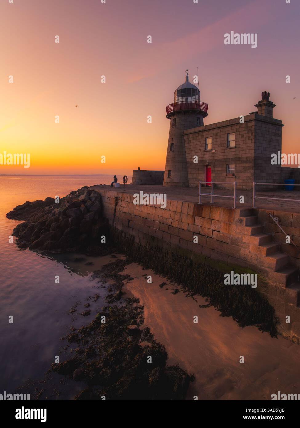 Sunset sky at Howth Lighthouse Stock Photo - Alamy