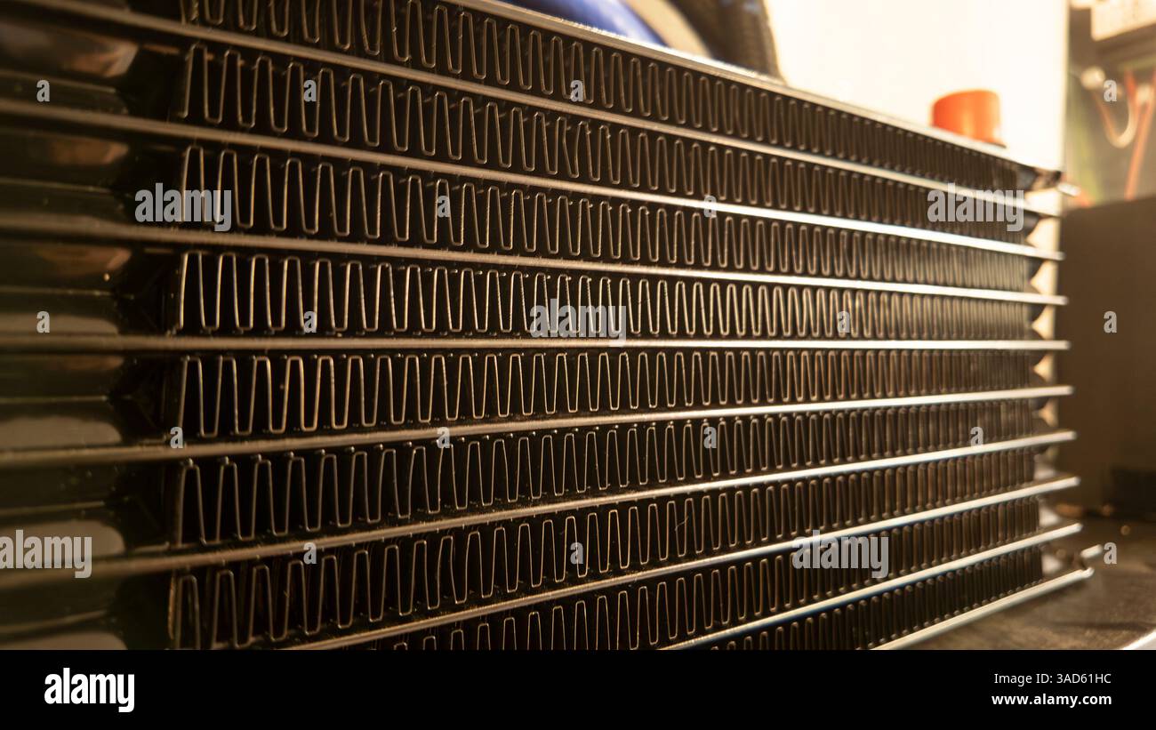 Cooling fins dissipating heat on a heat exchanger, crucial for ...