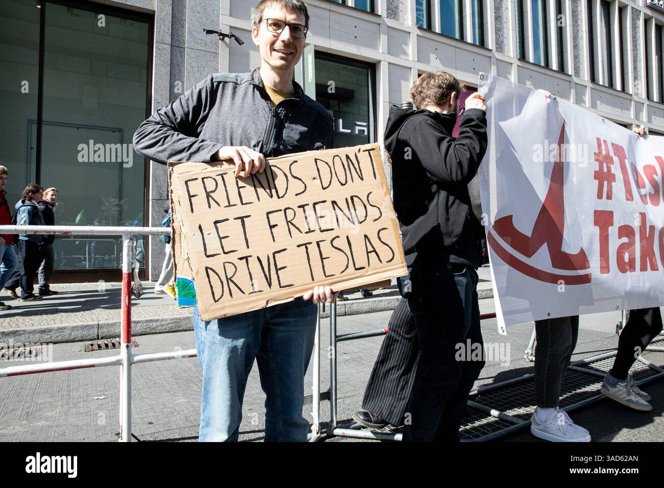 Demonstrators gathered outside the Tesla Store in Berlin’s Mall of ...