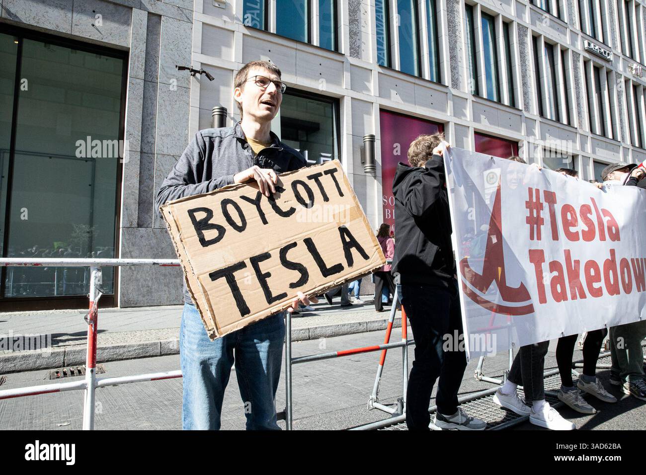 Demonstrators gathered outside the Tesla Store in Berlin's Mall of ...