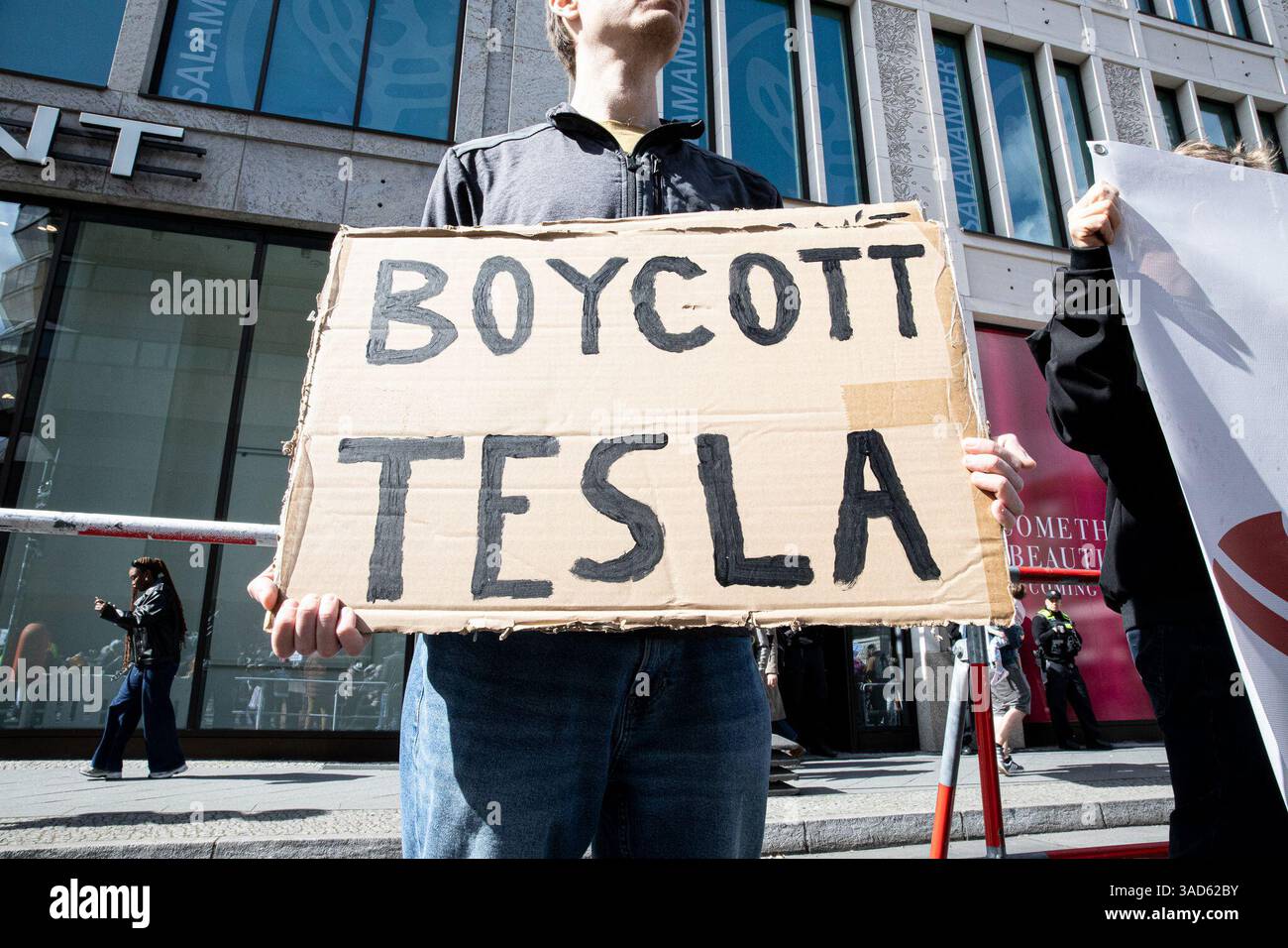 Demonstrators gathered outside the Tesla Store in Berlin's Mall of ...