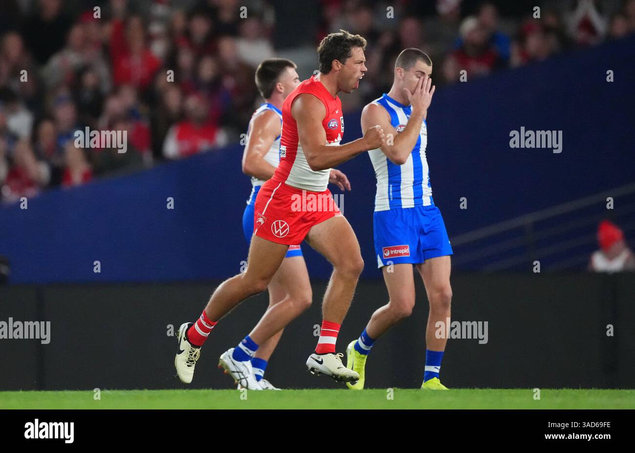 Oliver Florent of the Swans celebrates after kicking a goal during the ...