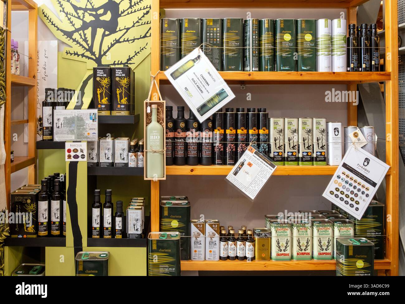 Retail display of Greek olive oil products, healthy food for sale in ...