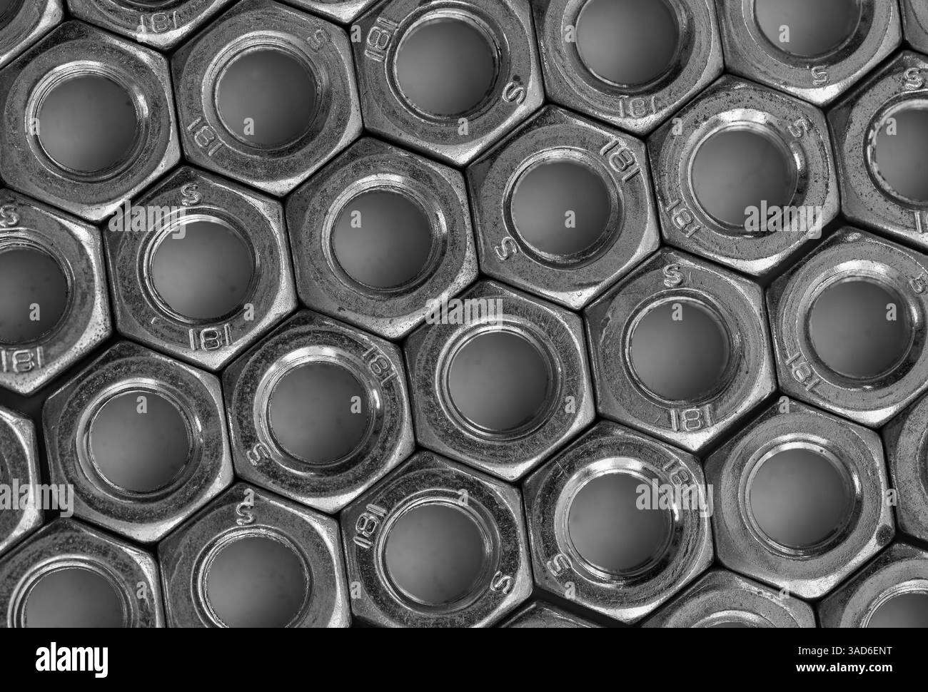 Group of engineering nuts shot from above in a pattern Stock Photo - Alamy