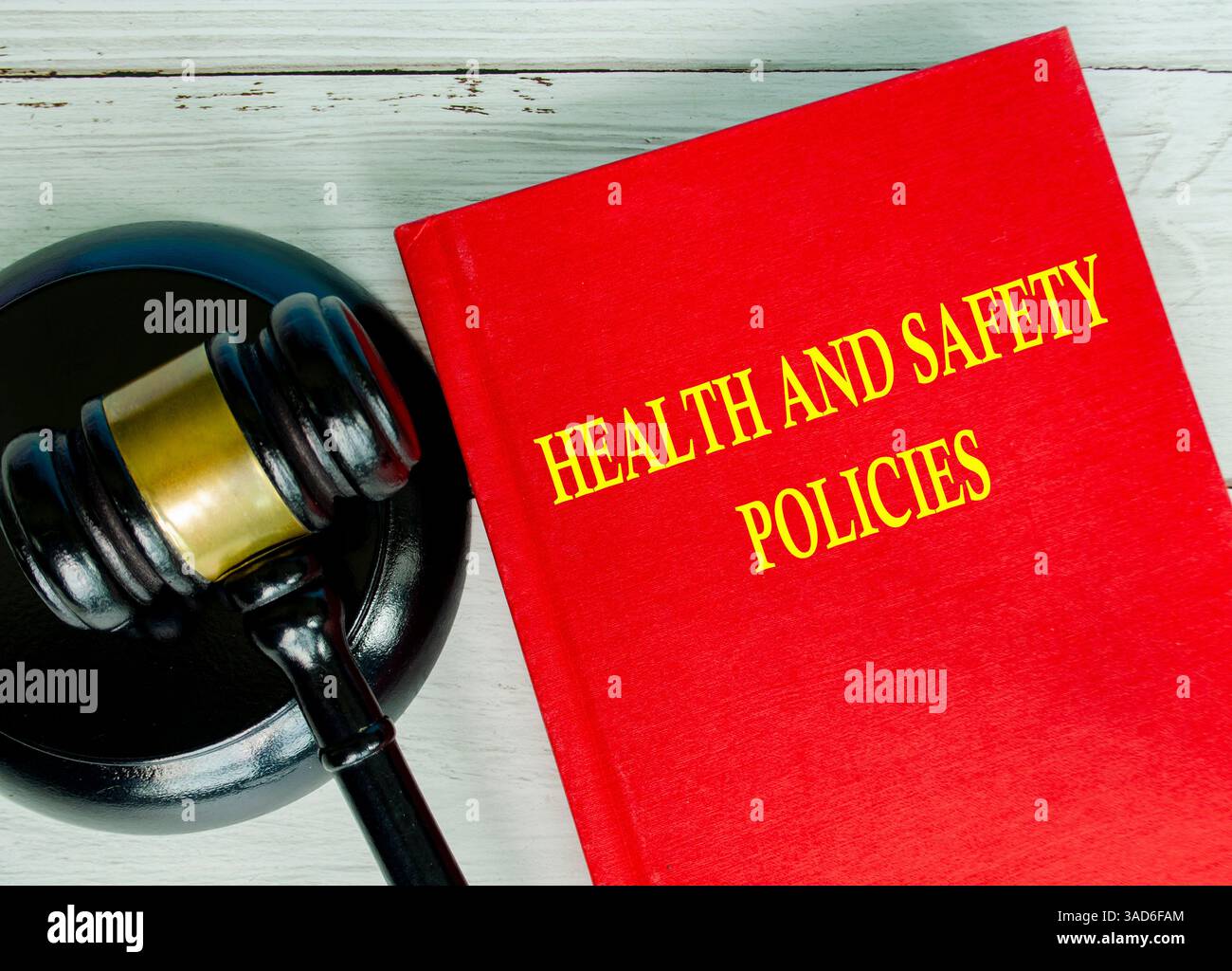 Top view of Health and Safety policies text on red cover book with ...